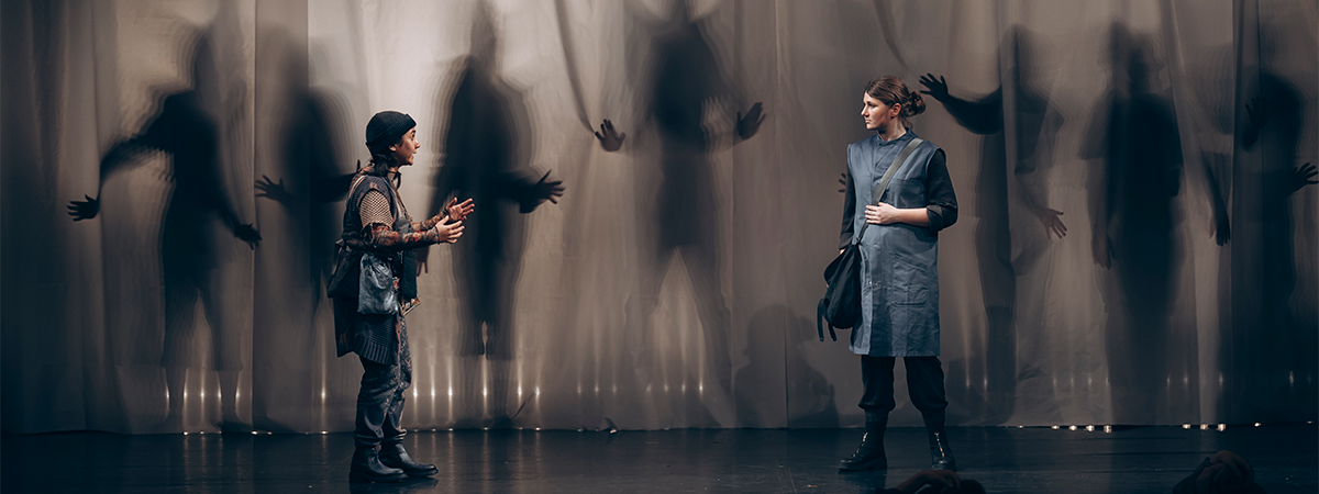 Backlit translucent fabrics define the mood on stage